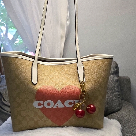 Coach | Bags | Coach Tan Tote With Heart And Cherry Charm | Poshmark